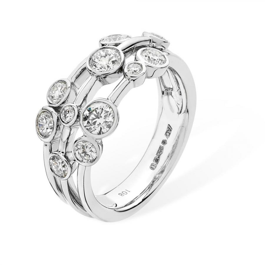 Three strand ring set with diamonds, in platinum | Saunders & Pughe