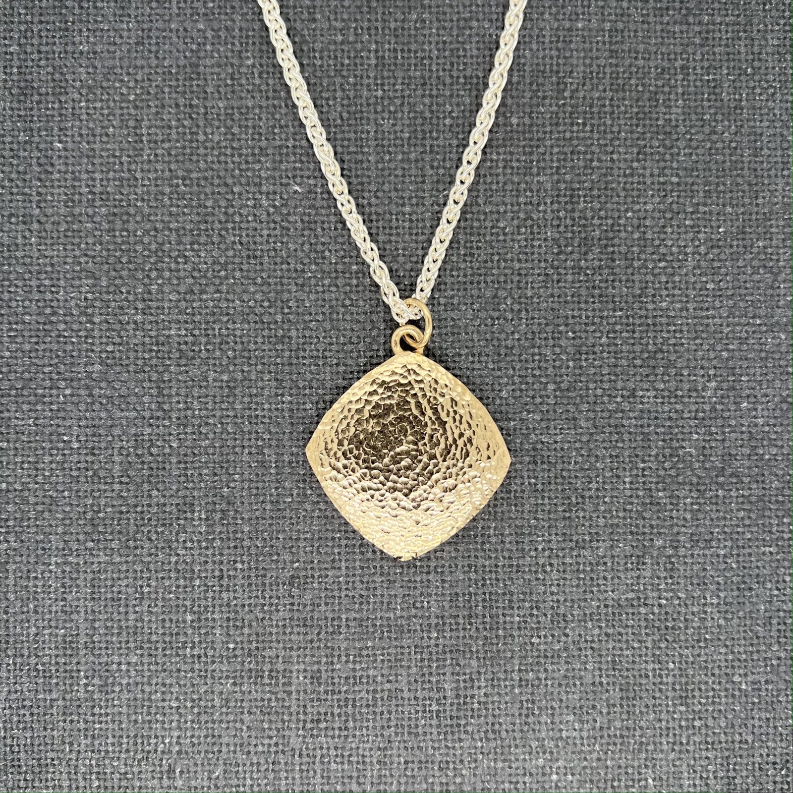 Dimple gold-plated pendant | Saunders & Pughe